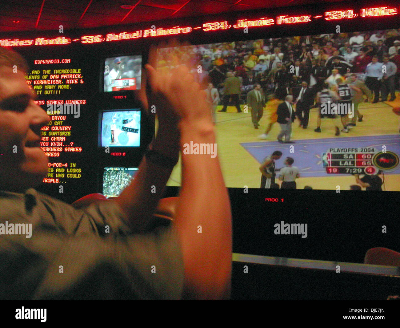 May 15, 2004; Las Vegas, Nevada, USA; Basketball fans watch and cheer ...
