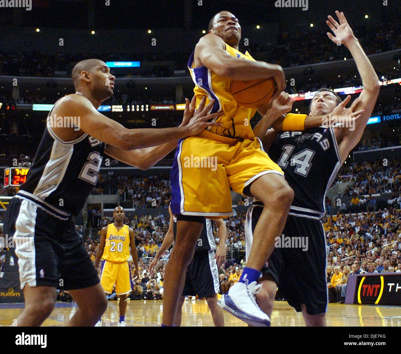 May 15, 2004; Los Angeles, CA, USA; Spurs' Tim Duncan and Hedo Turkoglu ...