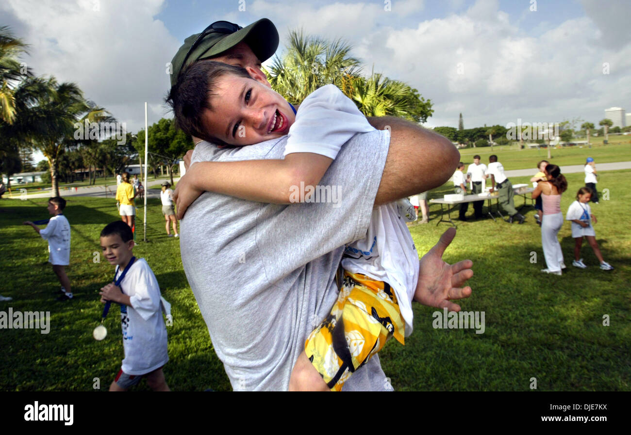 May 16, 2004; Palm Beach, FL, USA; SEAN HEFFERNAN, 6, of Miami, gets a ...