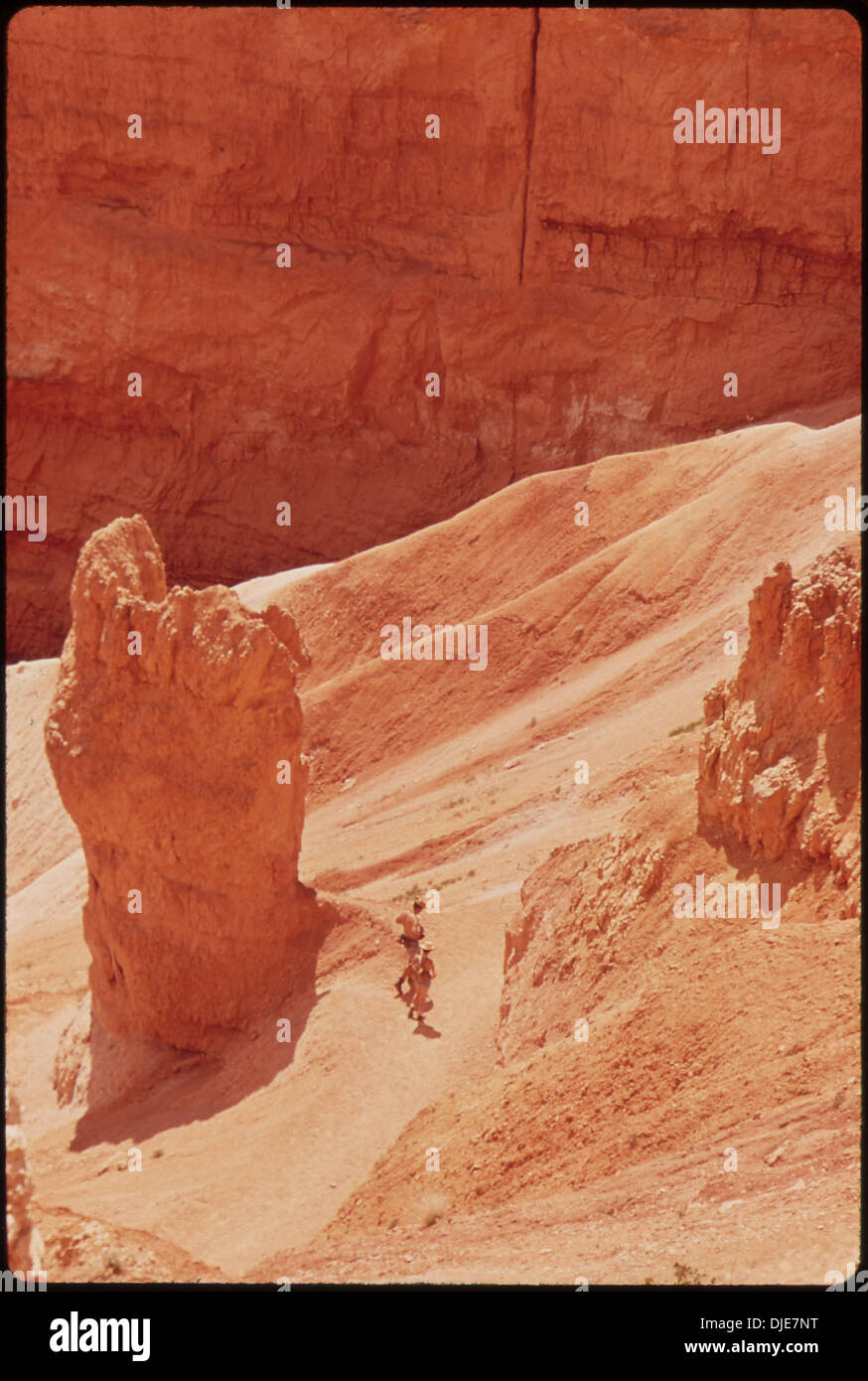 The reddish hue of rock formations is attributed to the presence of ...