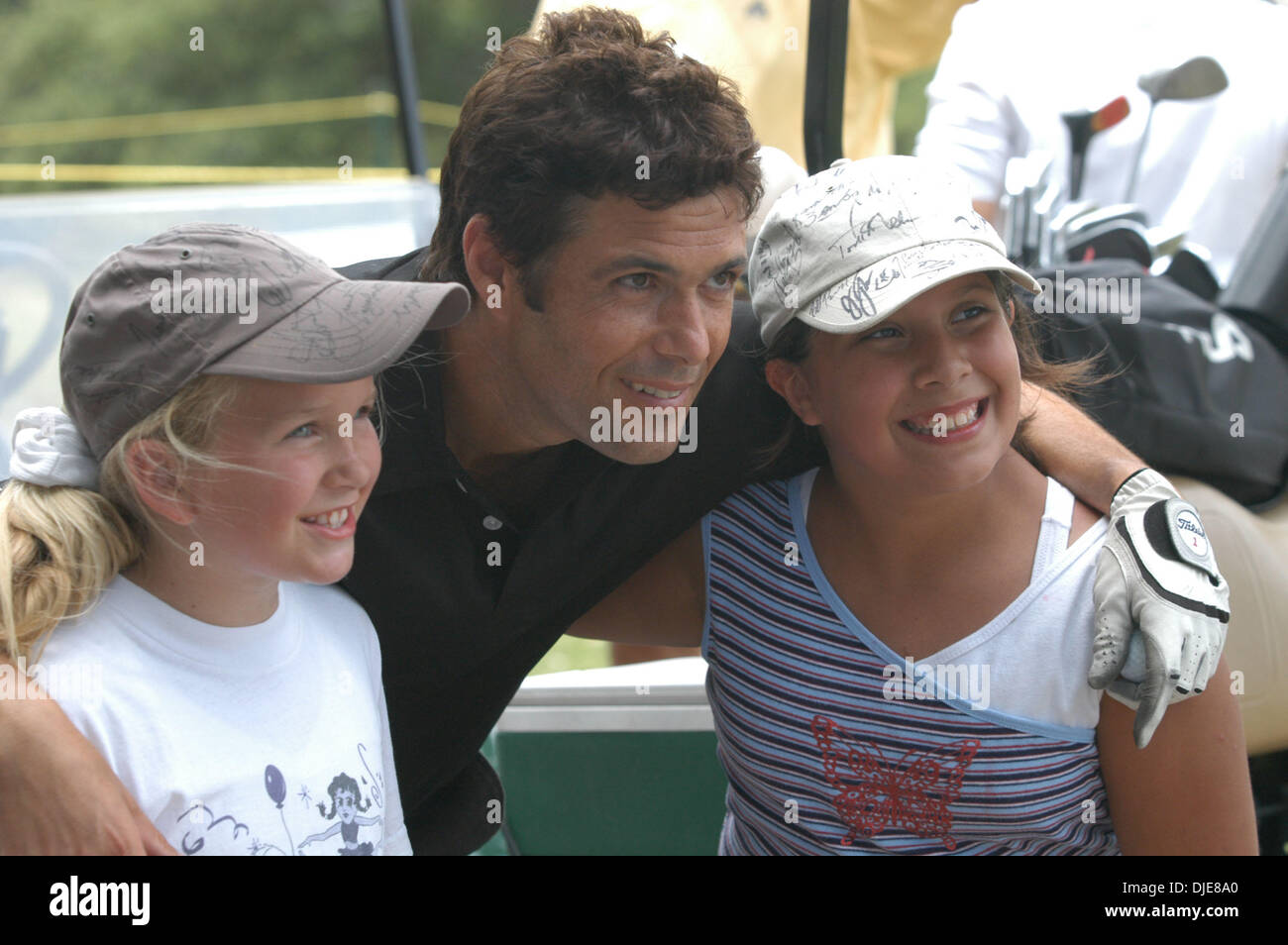 Jun 04, 2004; Austin, TX, USA; Actor CARLOS BERNARD poses with young ...