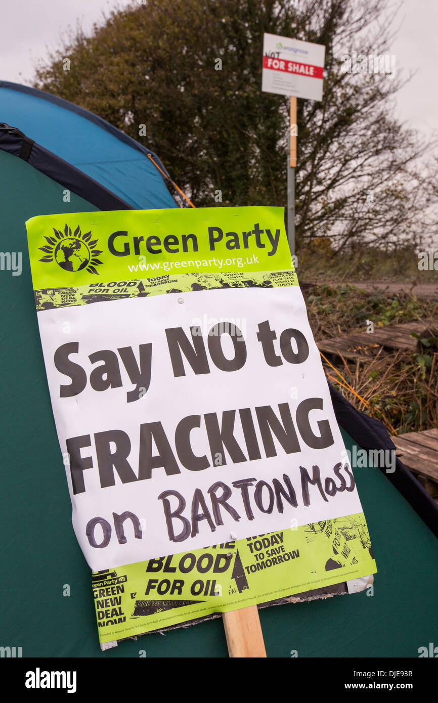 Banners protesting at a site on Chat Moss in Manchester that has been ...
