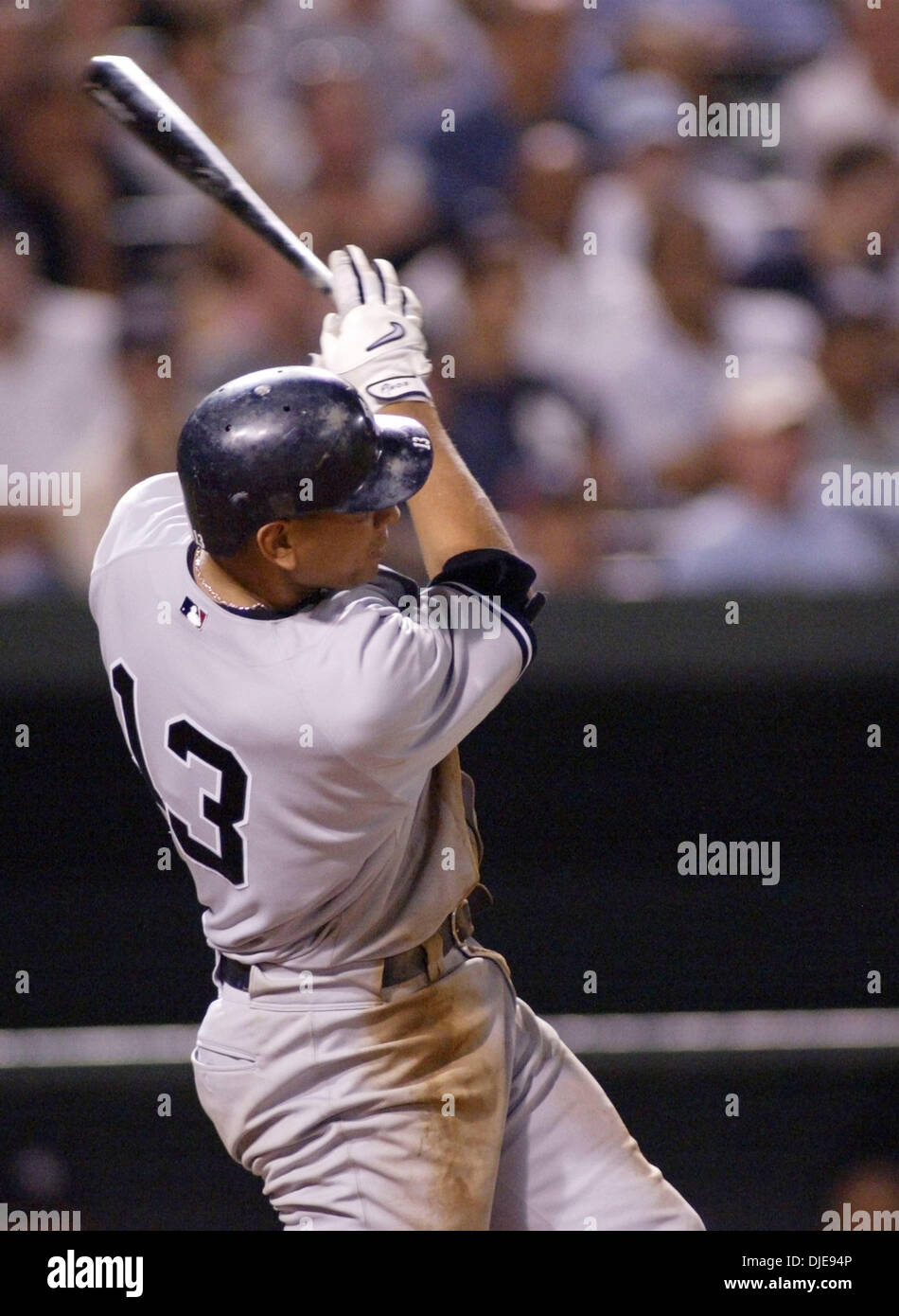 Jun 22, 2004; Baltimore, MD, USA; Yankees' ALEX RODRIGUEZ watches his ...