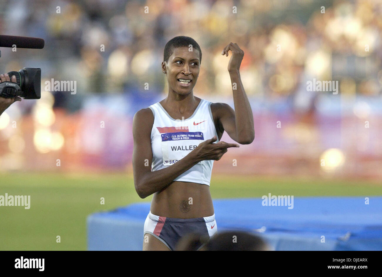 Jul 12, 2004; Sacramento, CA, USA; TISHA WALLER motions to her coach ...