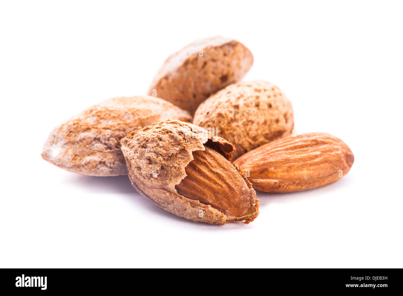 Unpeeled almond isolated Stock Photo - Alamy