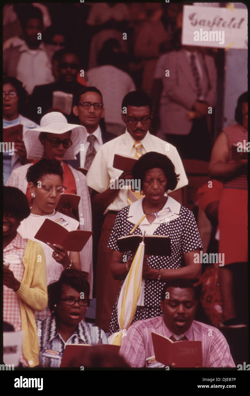 Jehovah's Witnesses sing during their outdoor worship services at the ...