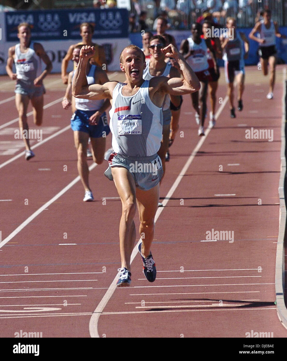 Jul 18, 2004; Sacramento, CA, USA; ALAN WEBB crosses the finish line of ...
