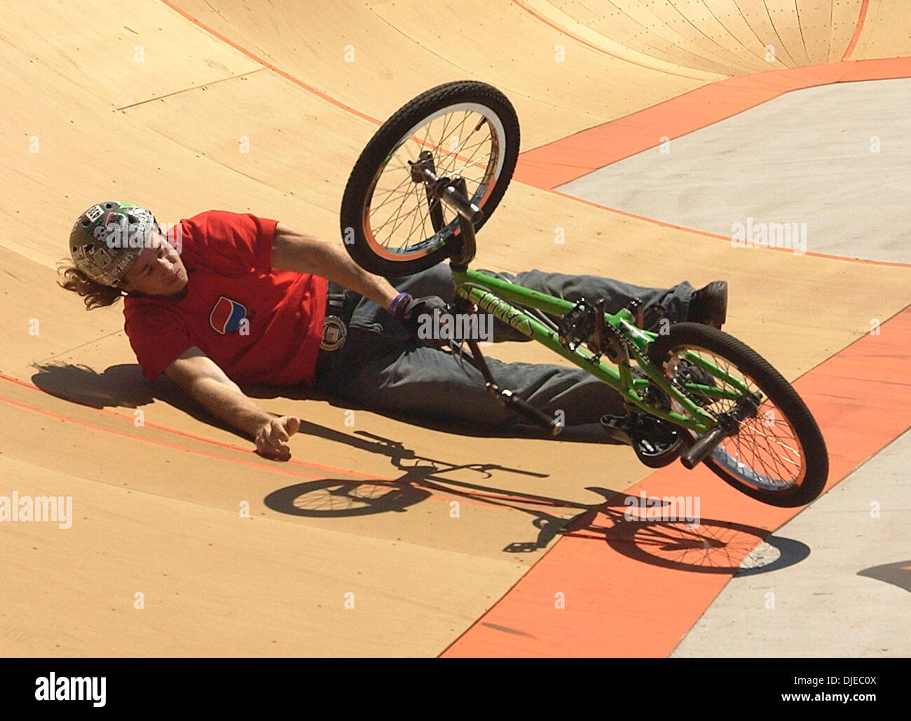Aug 07, 2004; Los Angeles, CA, USA; Pro BMX rider MORGAN WADE falls ...