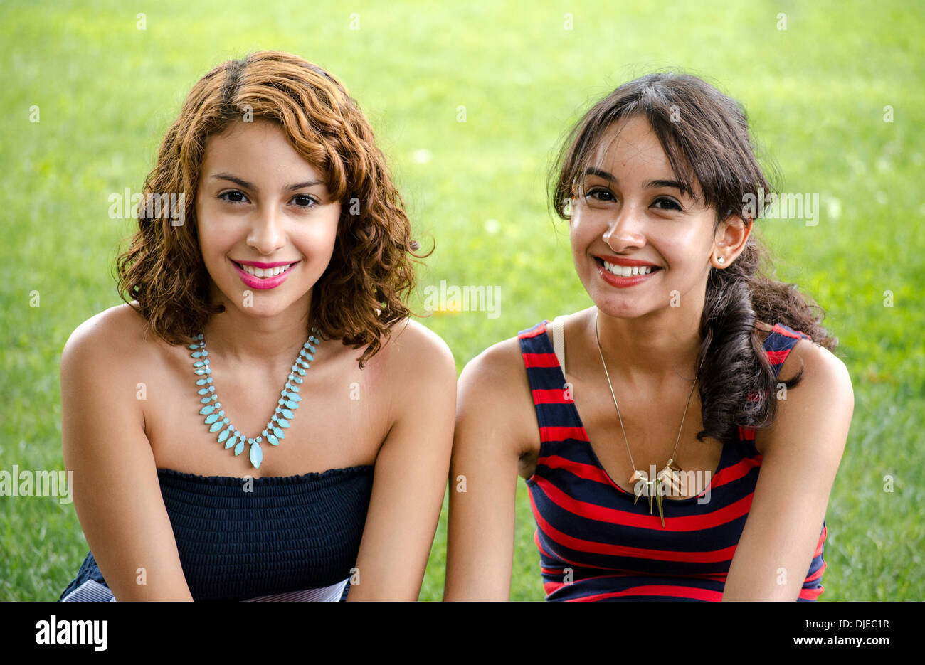 Two girls laughing together hi-res stock photography and images - Alamy