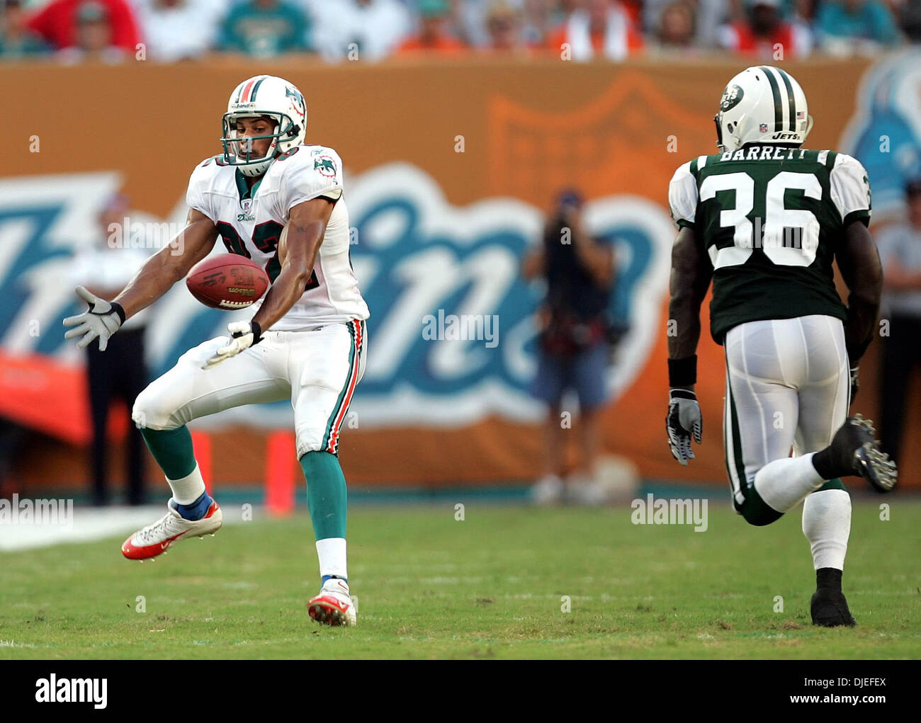 Oct 03, 2004; Miami, FL, USA; Miami's #82 BRYAN GILMORE makes a bobbled ...
