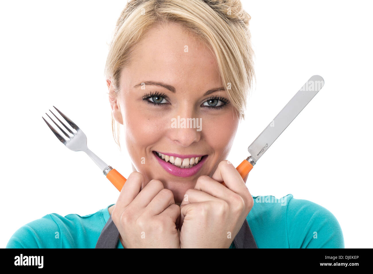 Woman holding knife and fork hi-res stock photography and images - Alamy