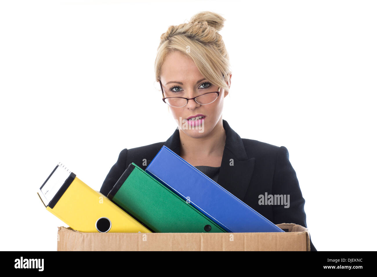 Model Released. Young Business Woman Carrying a Box of Files Stock ...