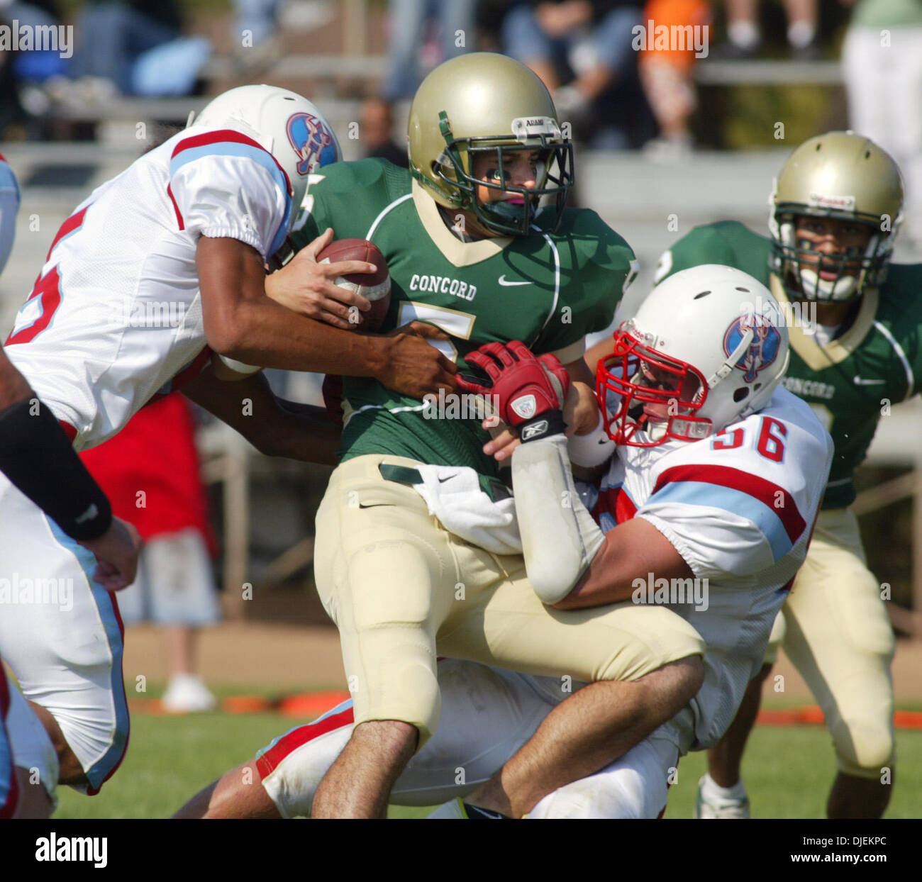 HIllsdale's Marcus Dunlap-Almo(left) and Kyle Vance(right) tackle ...