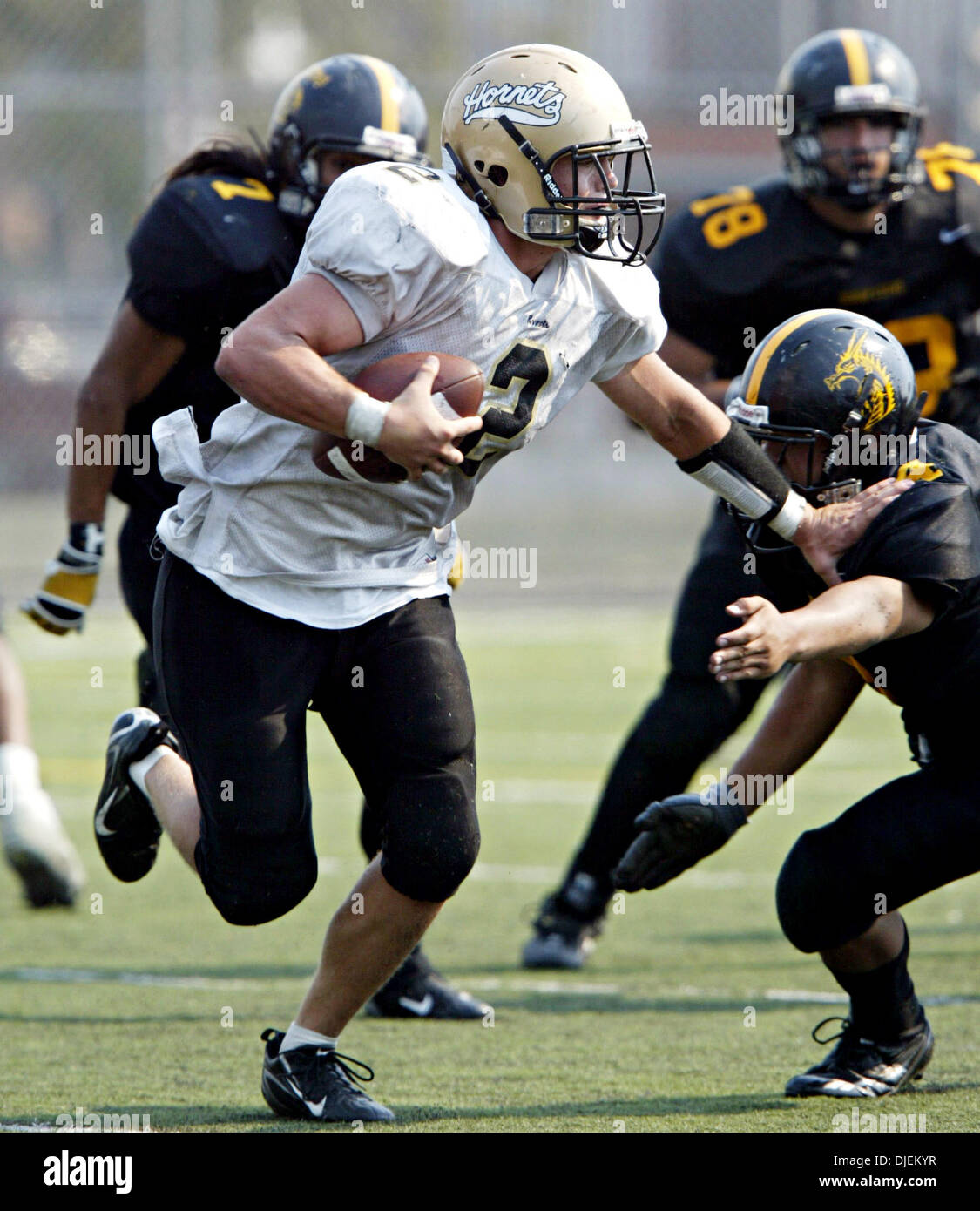 Alamedas quarterback wes moyer scrambles hi-res stock photography and ...