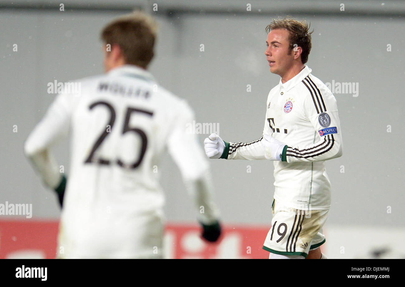 Moscow, Russia. 27th Nov, 2013. Munich's Mario Goetze (R) celebrates ...