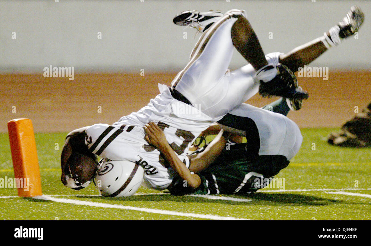 Mission’s #89 Travis Mederios stops Gunderson’s #21 Roger Rose from ...