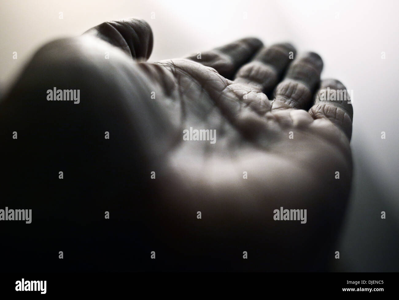 A hand reaching out Stock Photo - Alamy