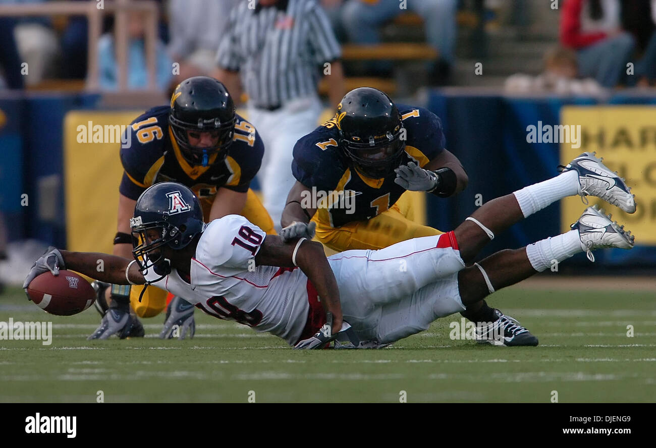 Arizona Wildcat's Delashaun Dean, #18, stretches for the extra yardage ...