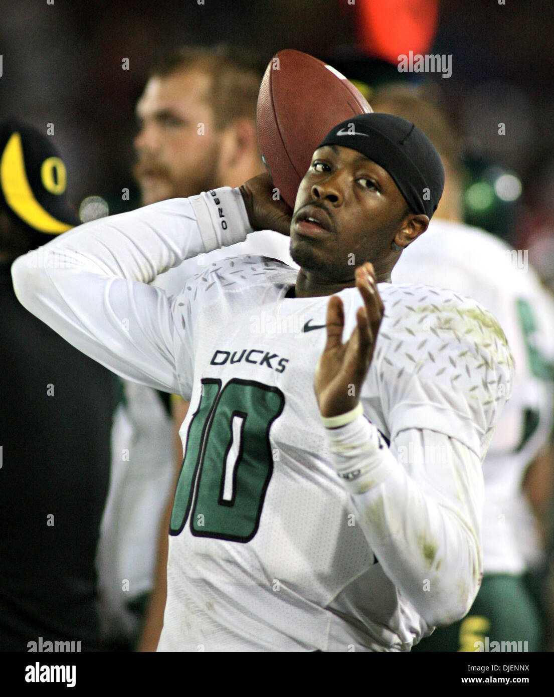 Oregon QB Dennis Dixon throws on the sideline at Stanford Saturday ...
