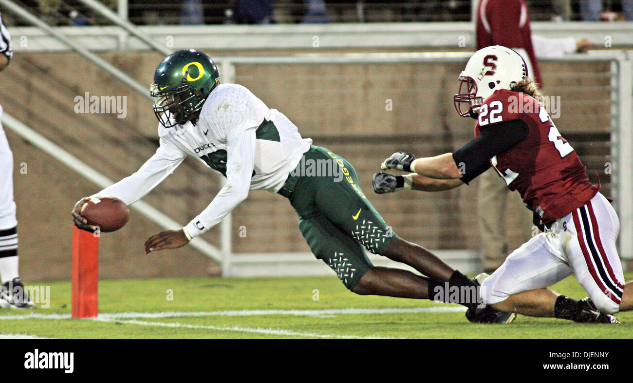 Oregon QB Dennis Dixon dives toward the end zone against Stanford ...