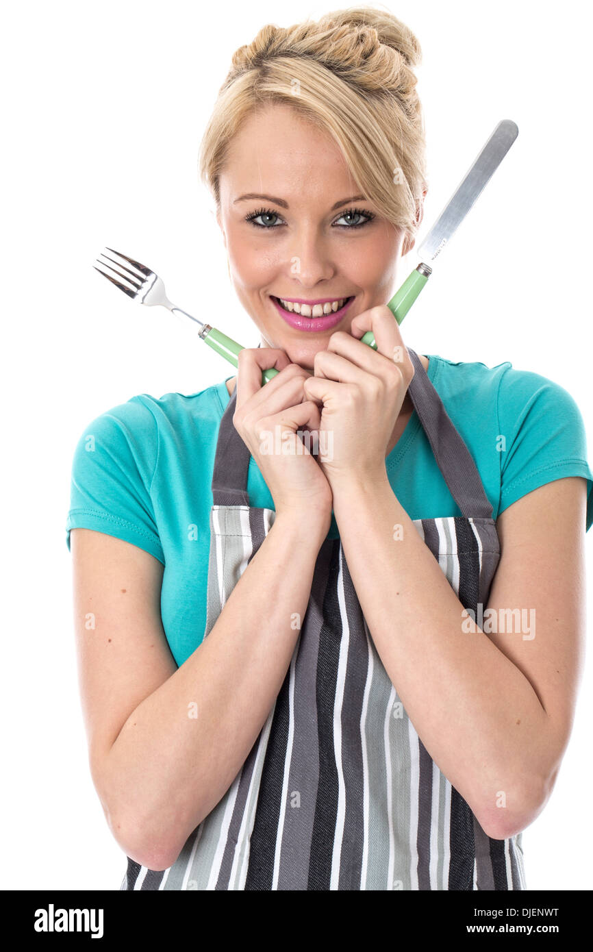Woman holding knife and fork hi-res stock photography and images - Alamy
