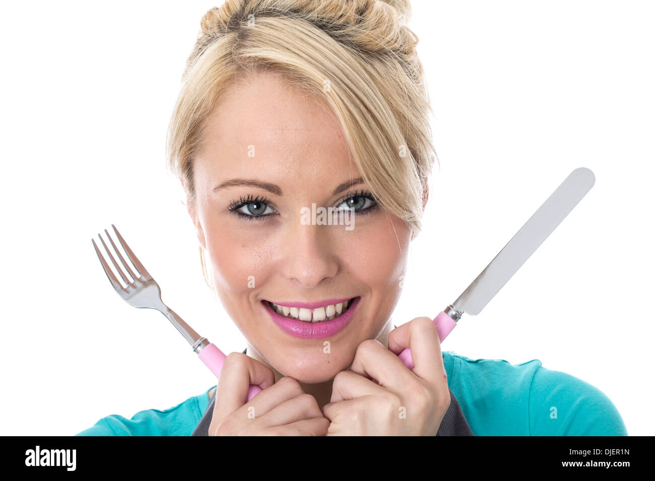 Woman holding knife and fork hi-res stock photography and images - Alamy