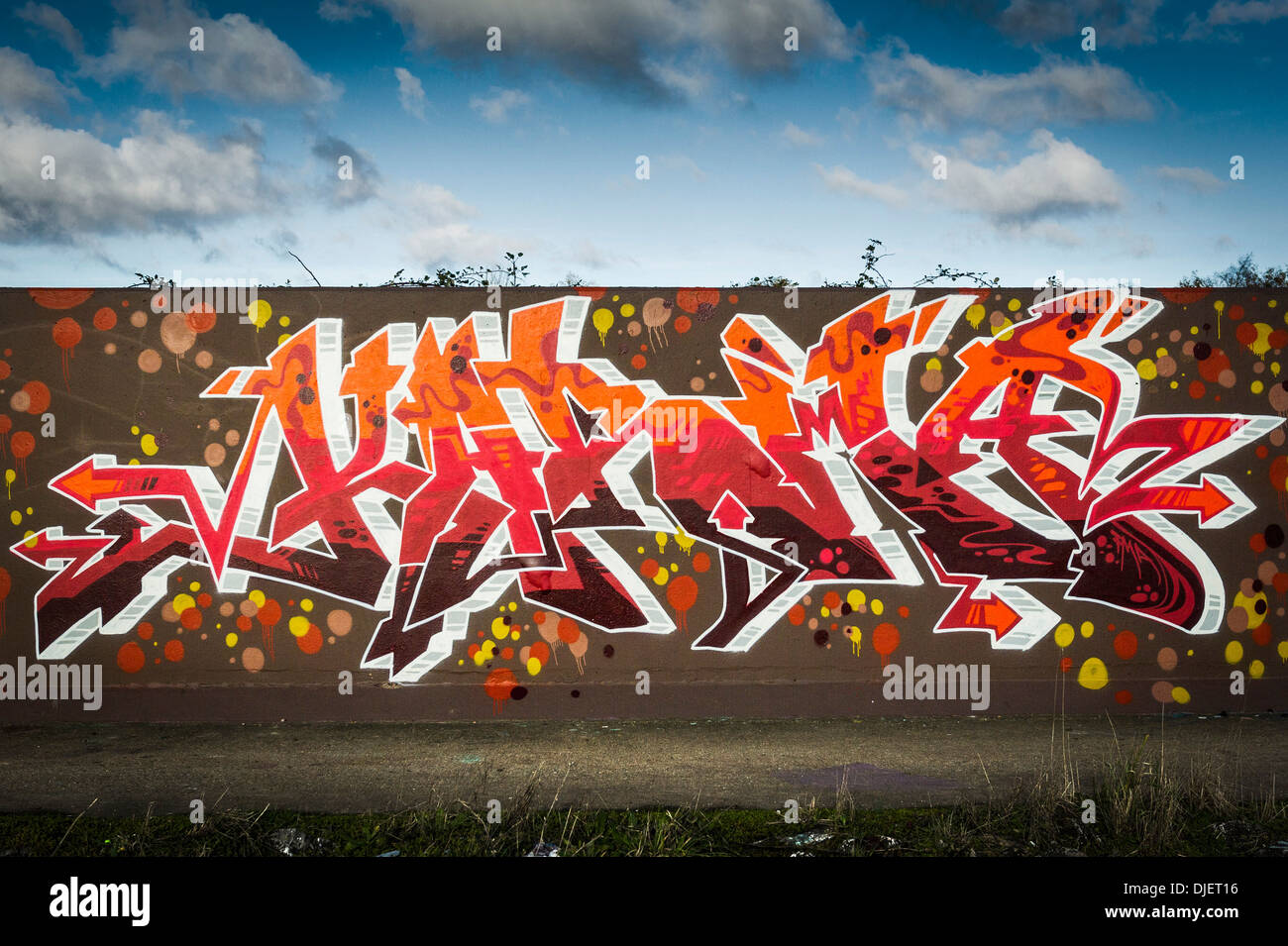 A wall covered in graffiti Stock Photo - Alamy