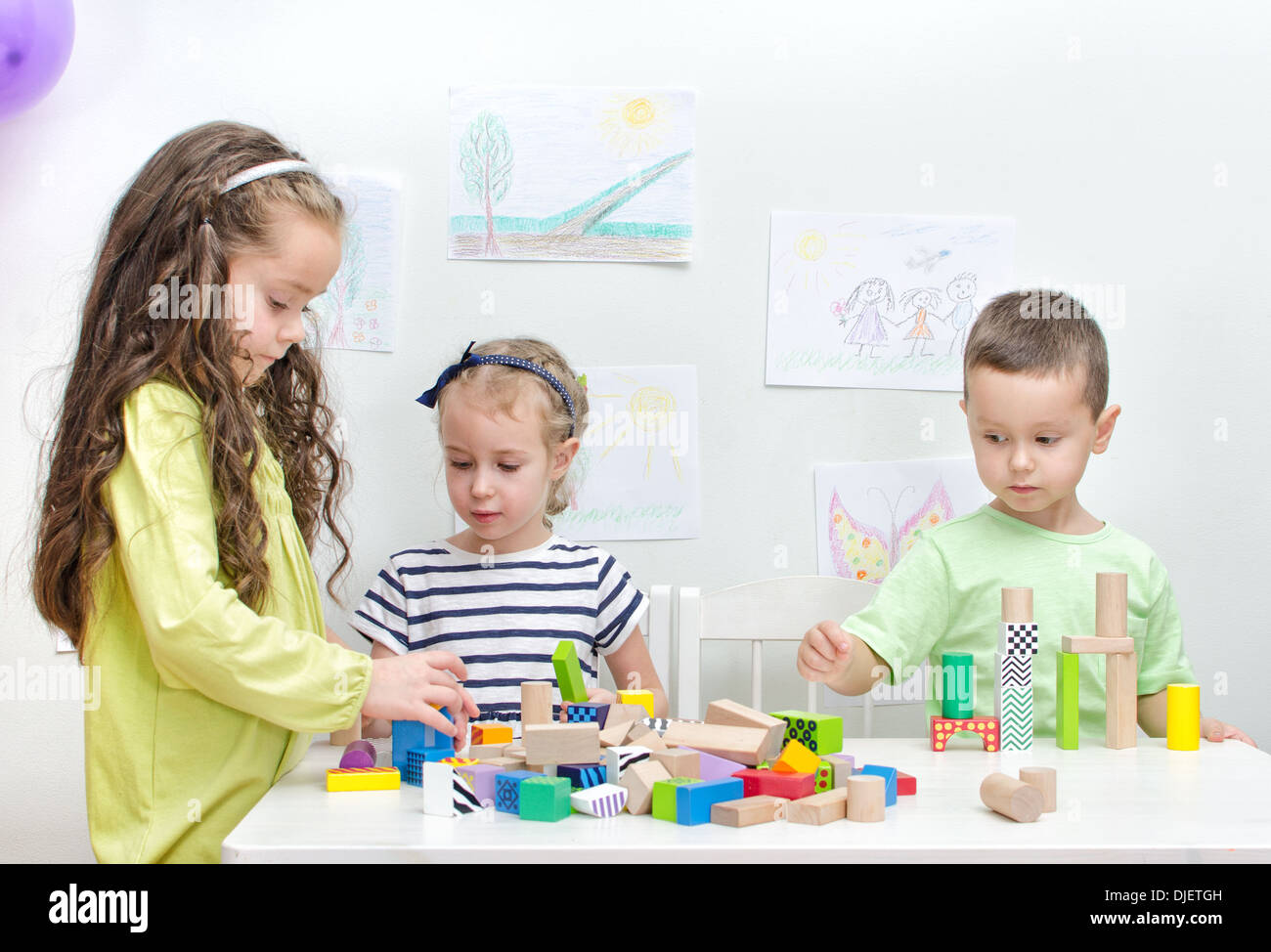 Children playing with blocks in kindergarten Stock Photo - Alamy