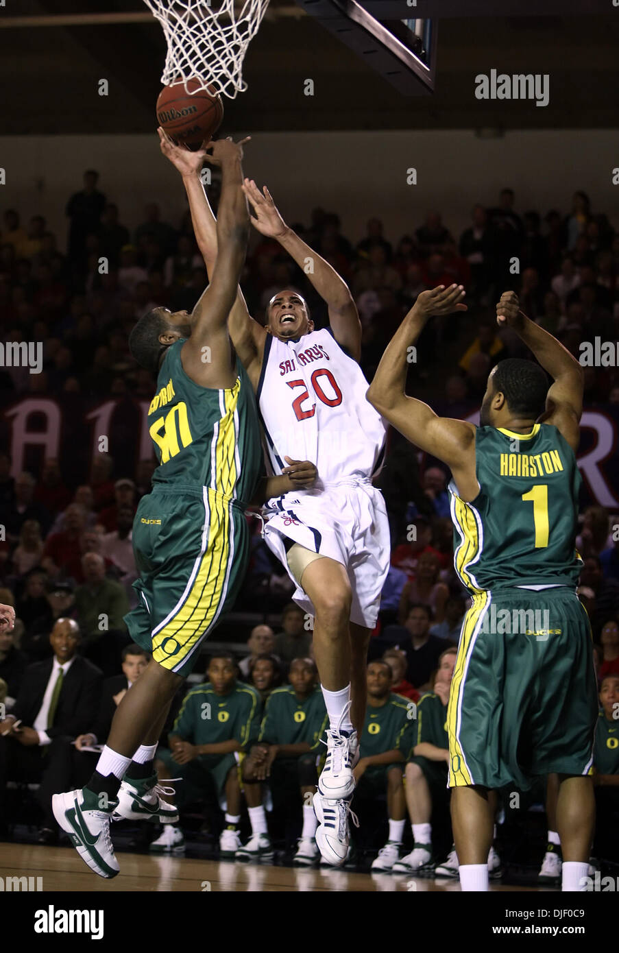 Saint Mary's Gaels' Diamon Simpson, #20, goes up for the basket while ...