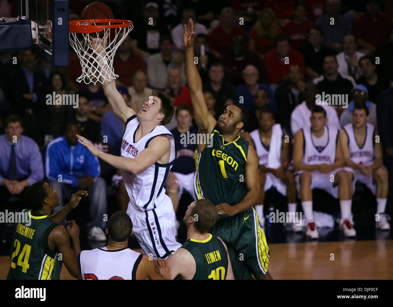 Saint Mary's Gaels' Lucas Walker, #12, shoots past Oregon Ducks' Malik ...