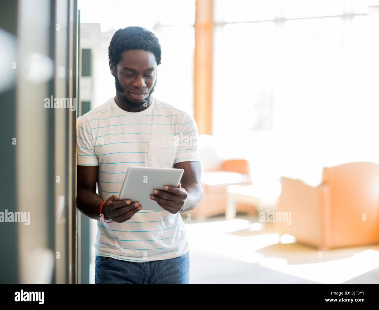 Male looking at window library hi-res stock photography and images - Alamy
