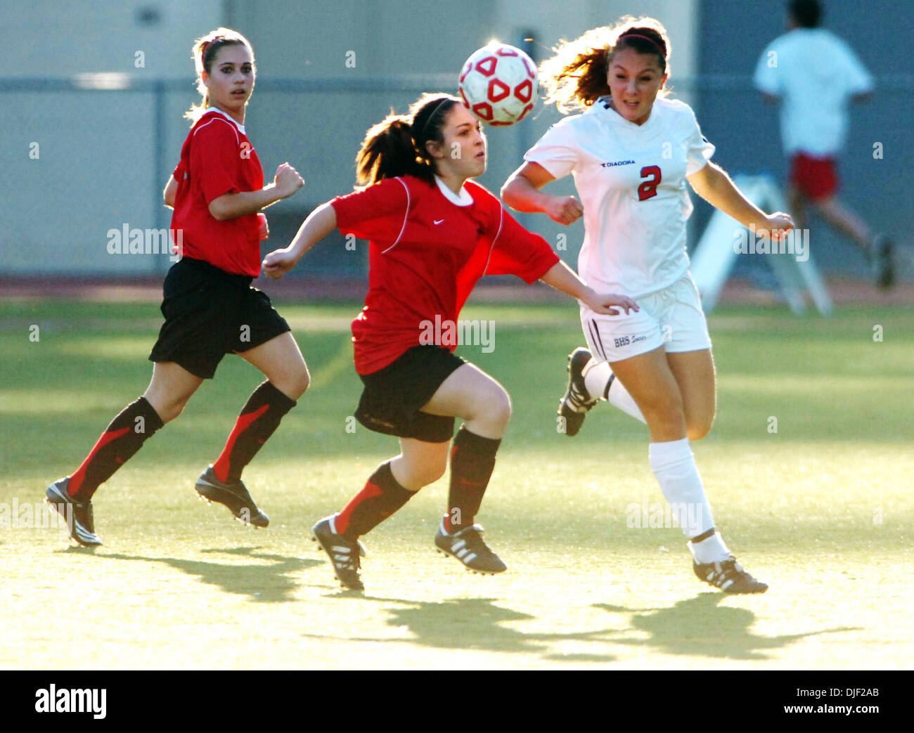Aragon High School athlete Lizzy Maggi, center, controls the ball ...
