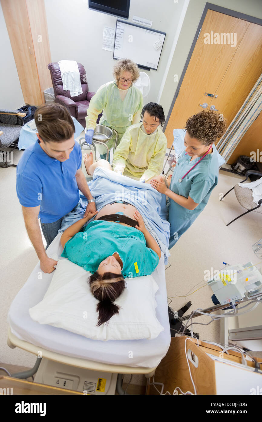 Woman giving birth happy hi-res stock photography and images - Alamy