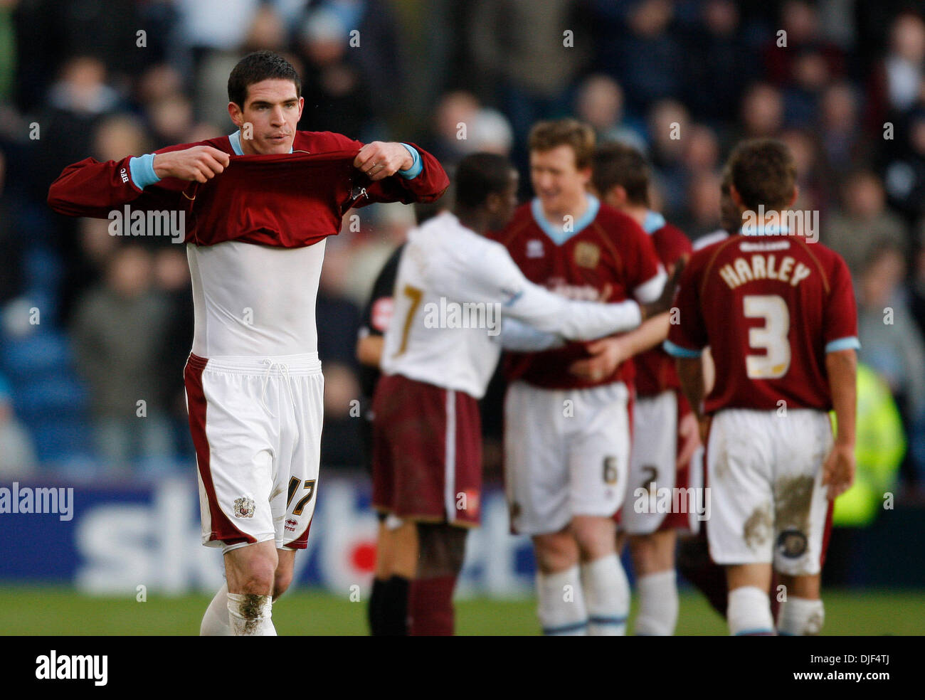 Kyle Lafferty of Burnley prepares to hide his head after being sent off ...