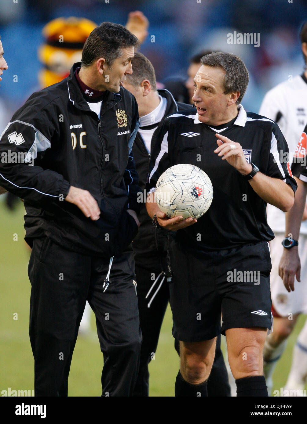 Referee Alan Wiley explains the sending off to Burnley manager Owen ...