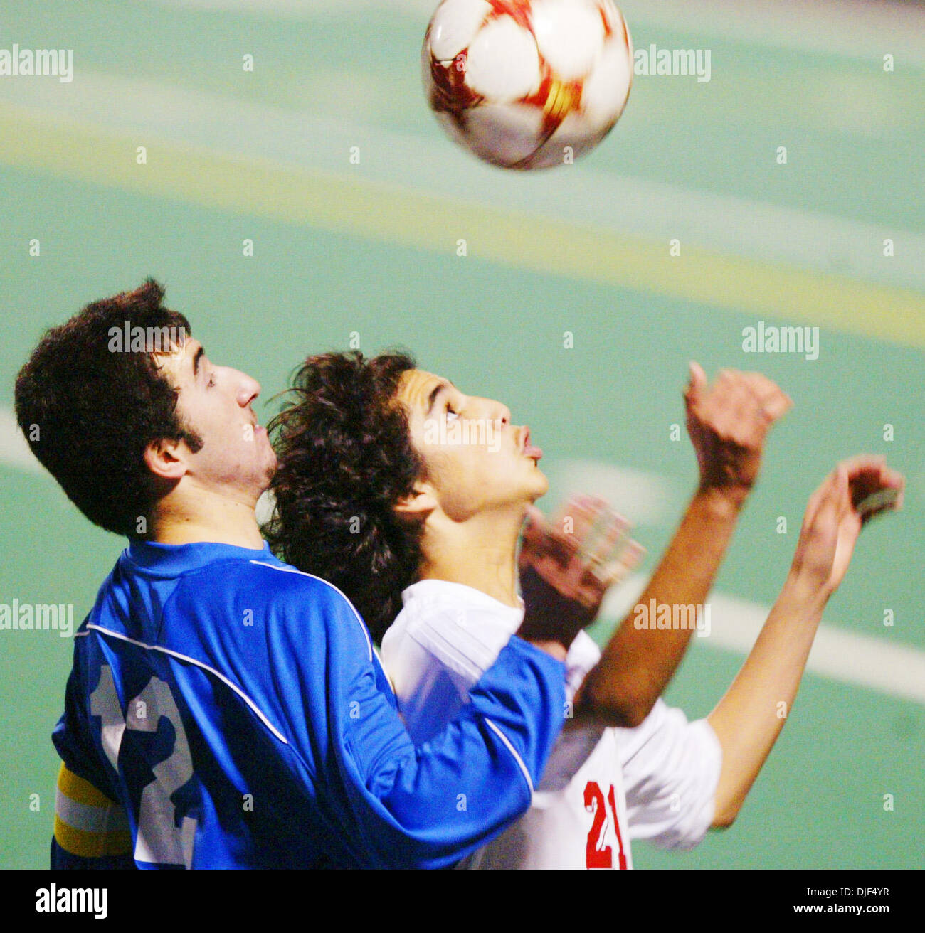 Newark Memorial's (12) Phil Pollack and James Logan's (21) Jorge ...