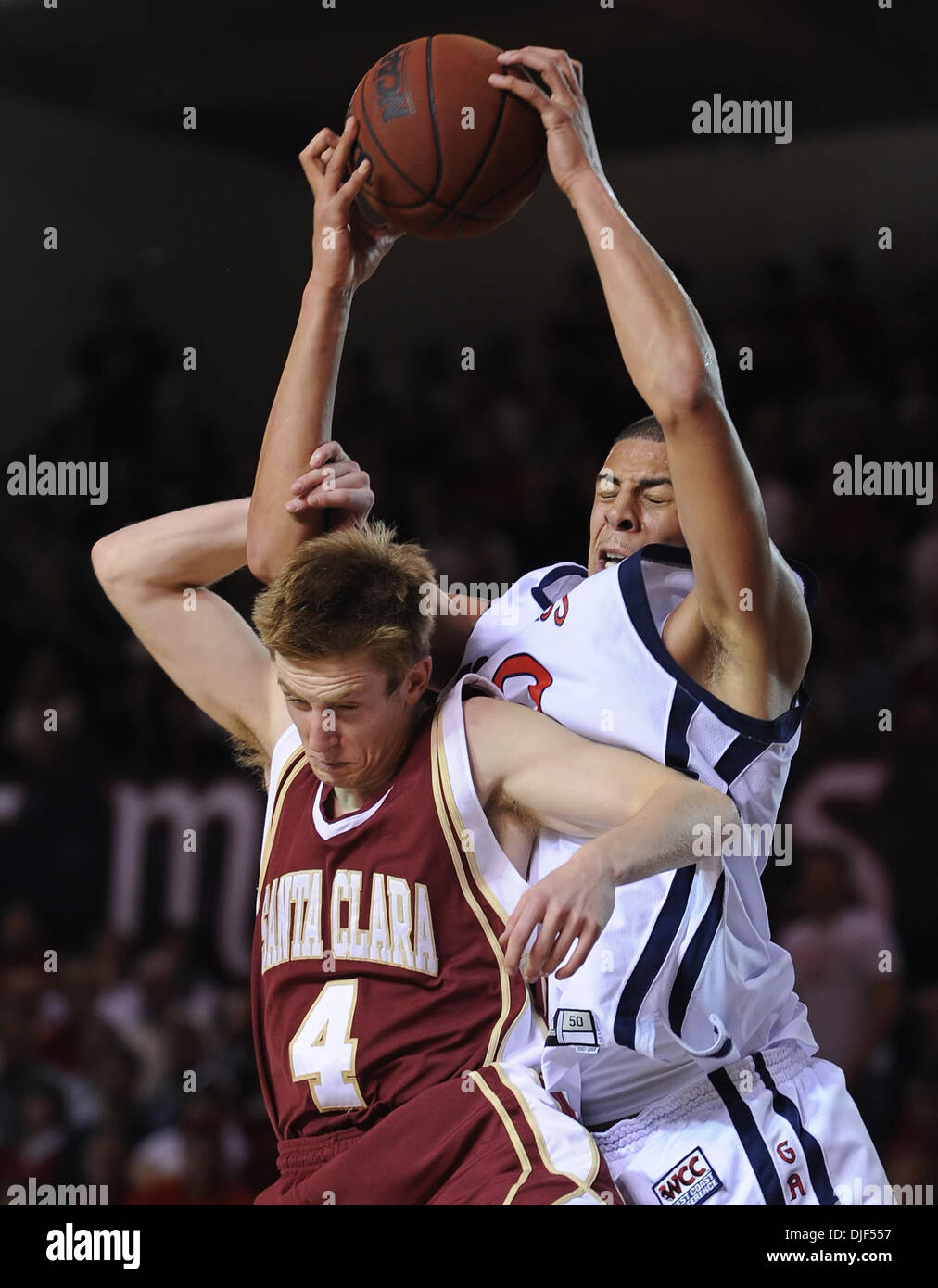 St. Mary's Gaels Diamon Simpson, #20, reaches for a rebound over Santa ...