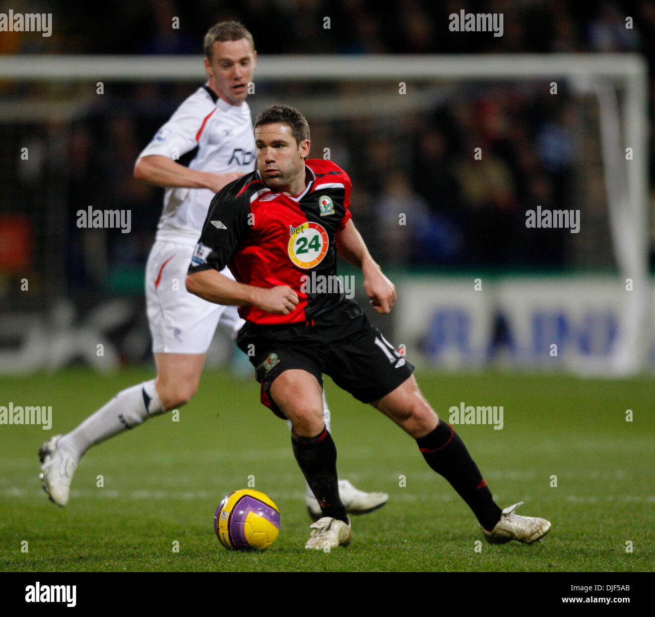 Blackburn Rover's David Dunn shadowed by Bolton Wanderers Kevin Nolan ...