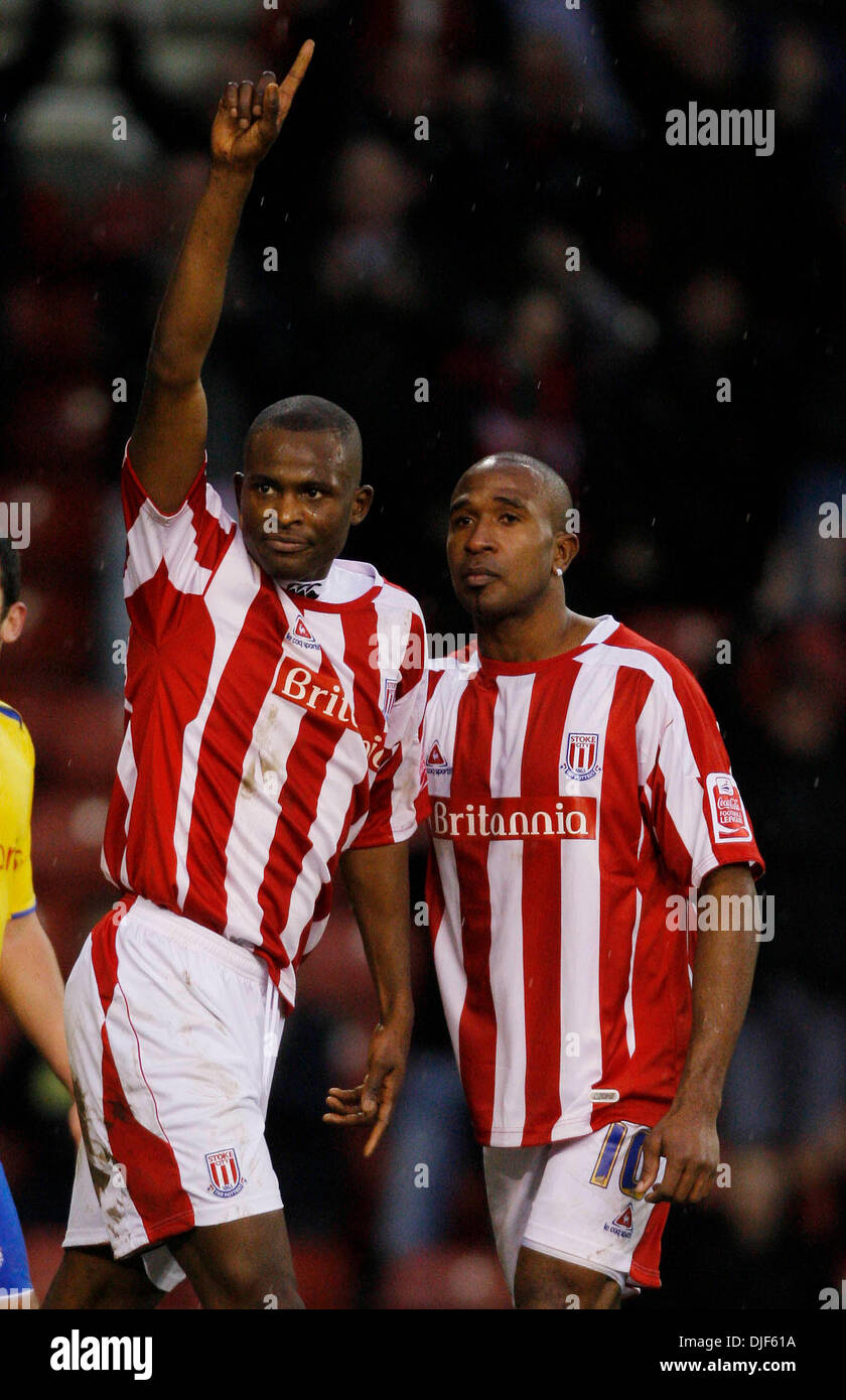 Leon Cort (L) of Stoke City celebrates scoring the third goal with ...