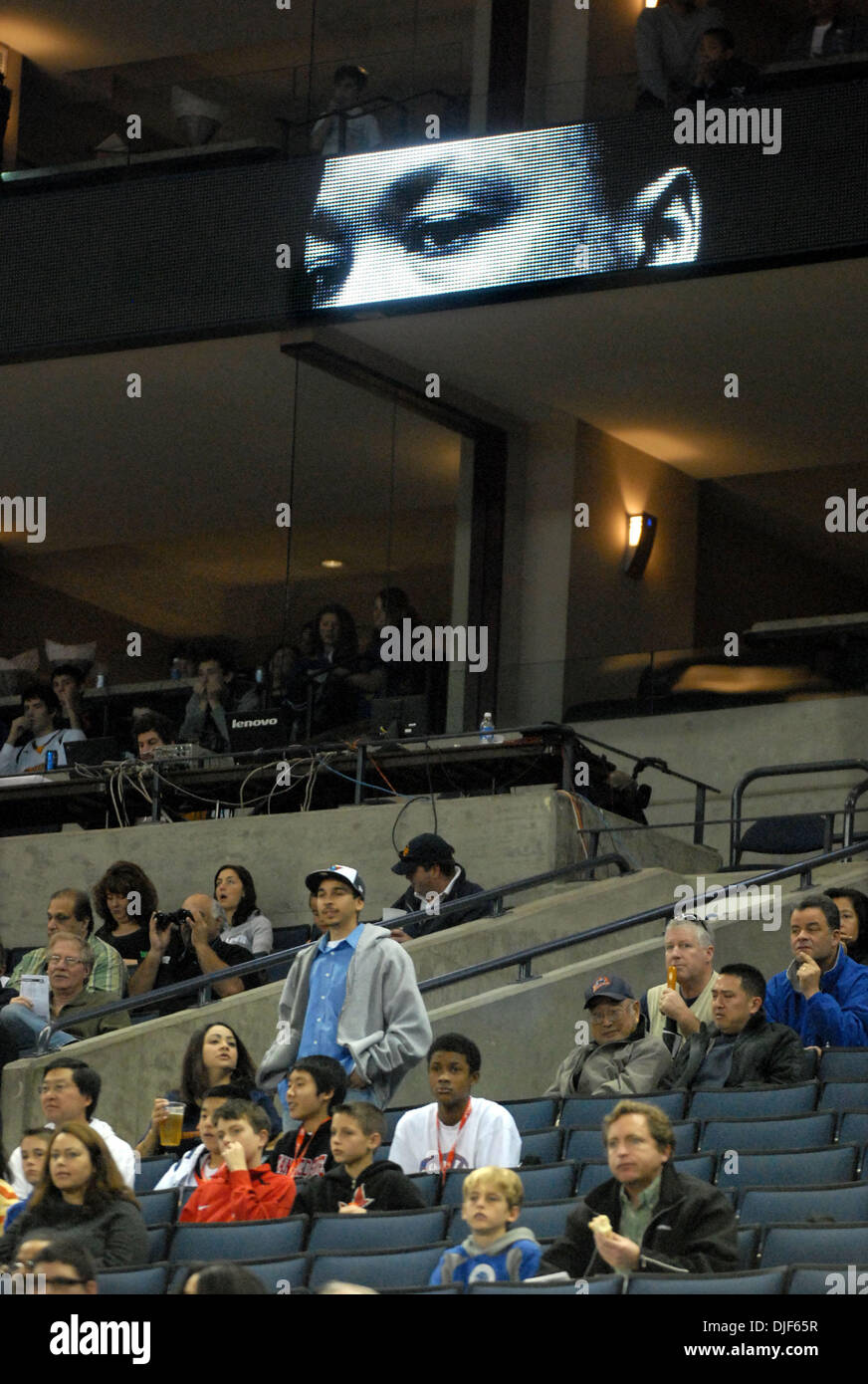 An image of Dr. Martin Luther King Jr. looms above fans before the ...