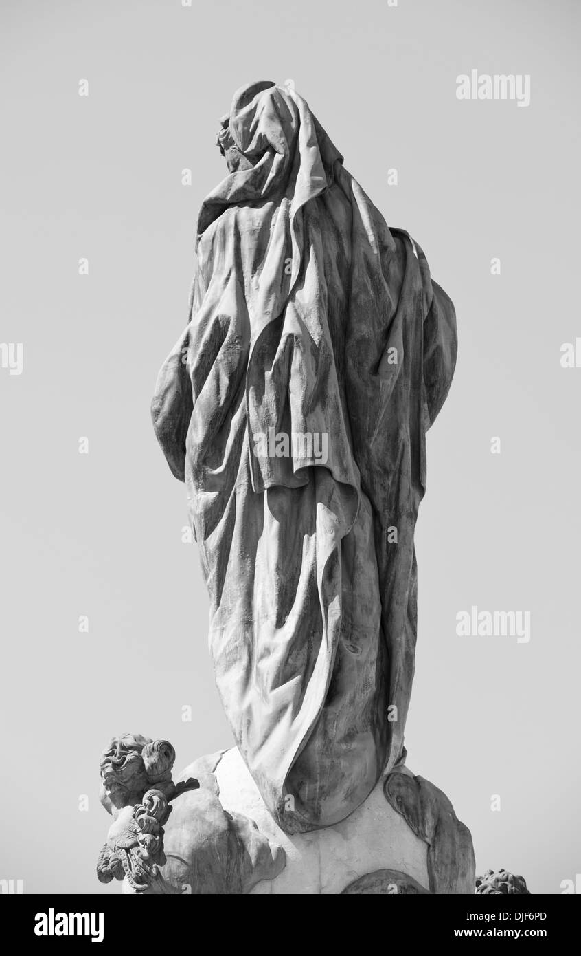 rear view of statue showing folds in cloak Stock Photo - Alamy