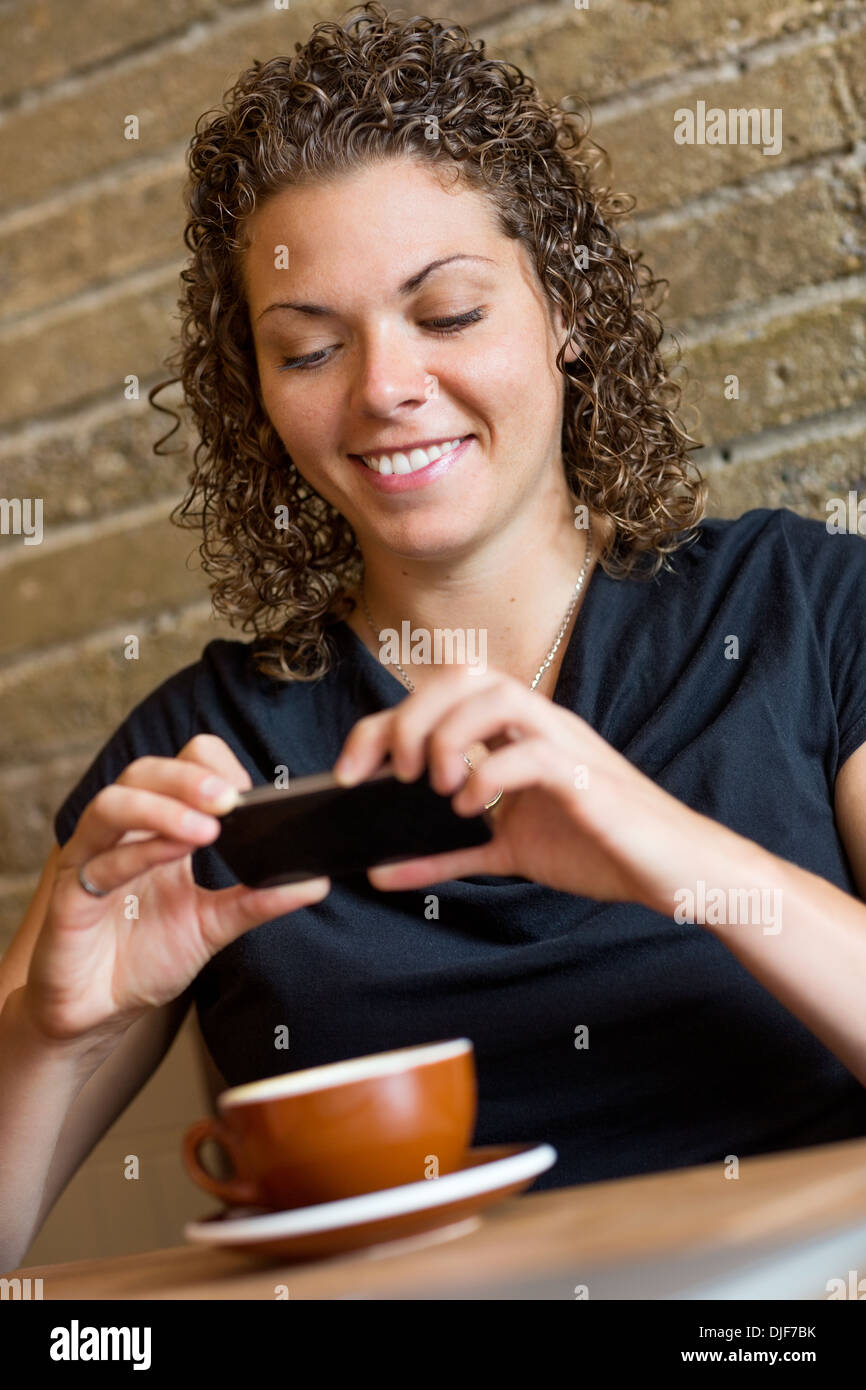 Woman Photographing Coffee In Cafeteria Stock Photo - Alamy