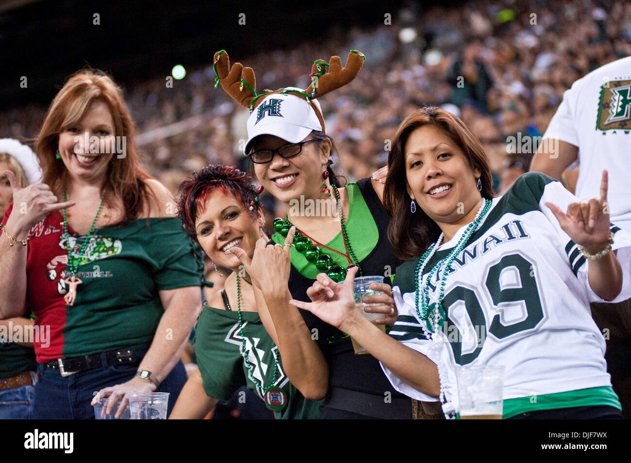 Hawaii fans pose during first half action in the game between the ...