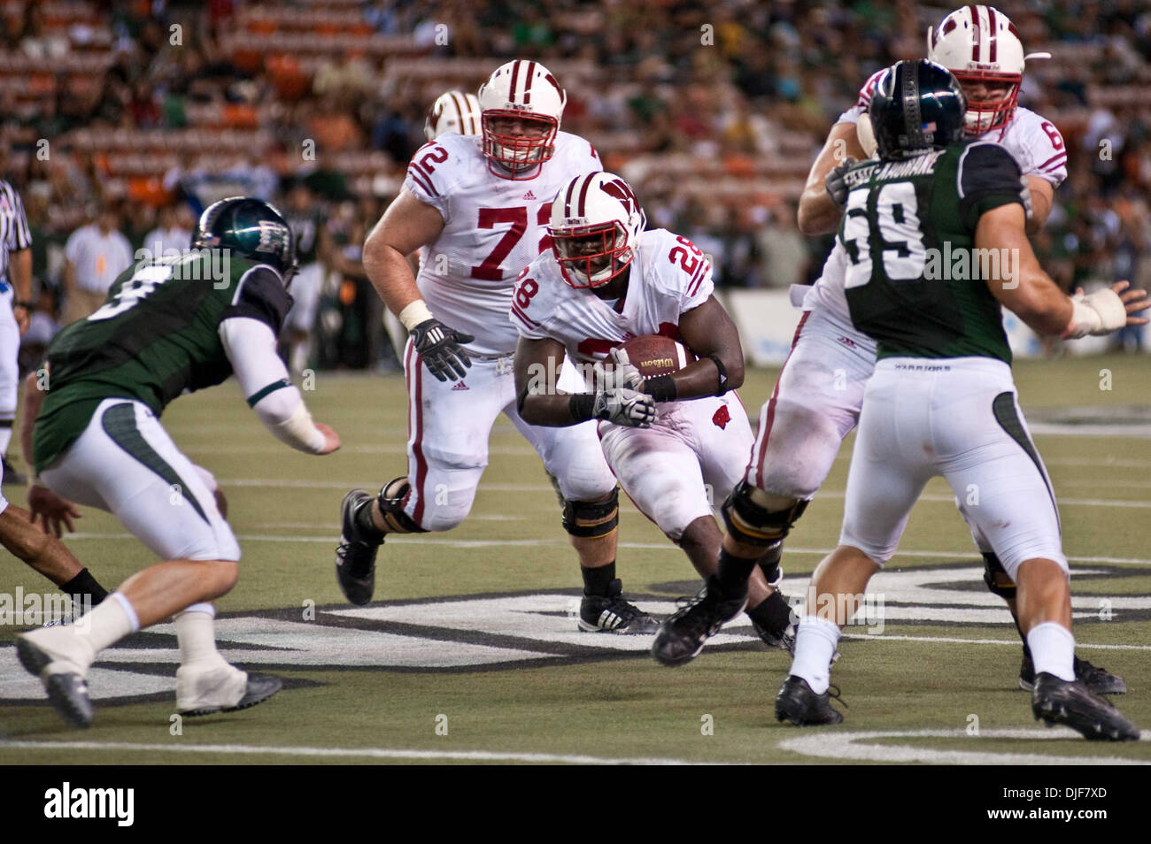 Wisconsin running back Montee Ball #28 finds a hole during the game ...