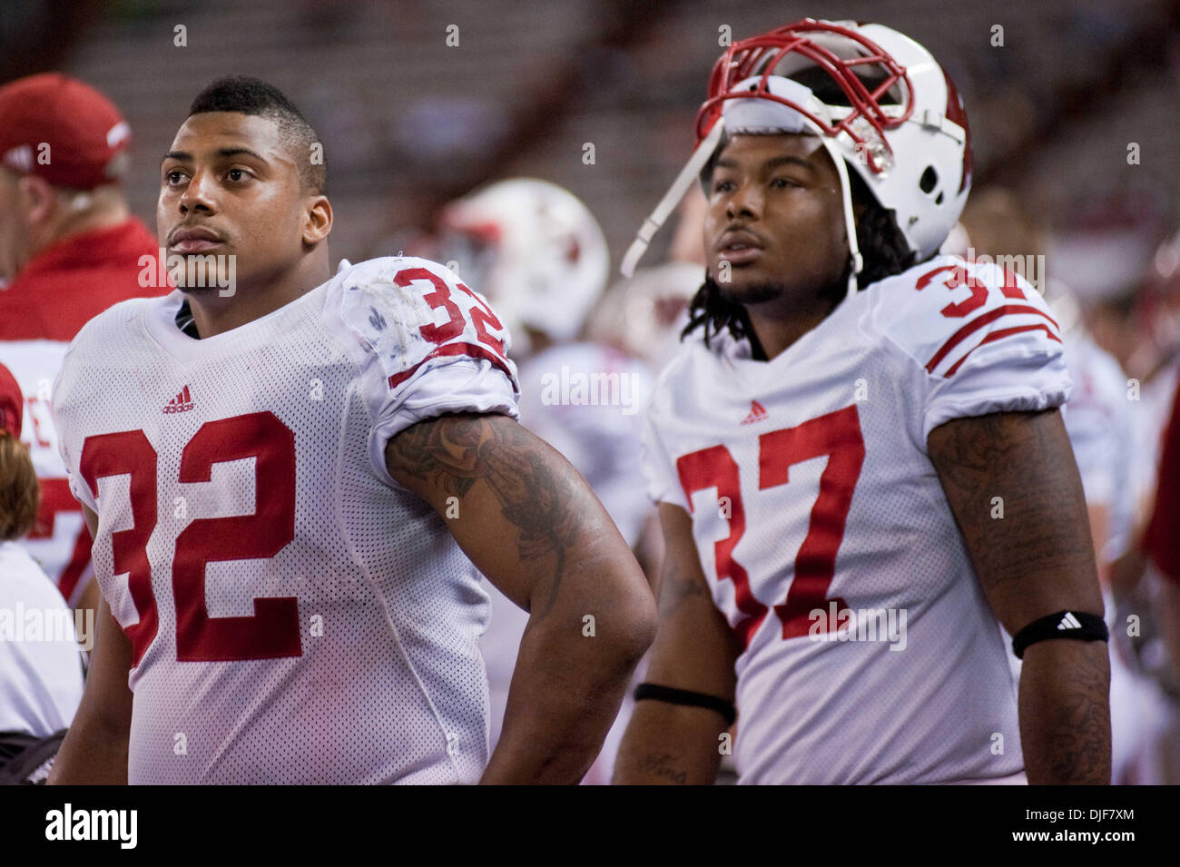 Wisconsin running back John Clay #32 and Wisconsin cornerback Kevin ...