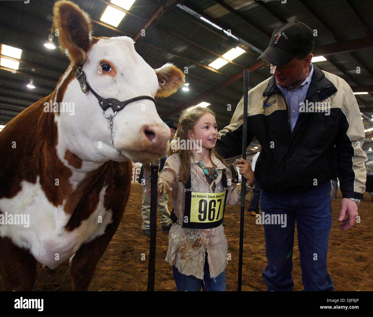 FOR METRO - Rylee Barber, 9, (center) is congratulated by her dad Brett ...