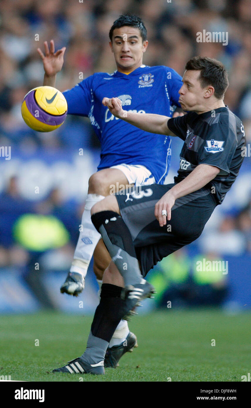 Nicky Hunt of Reading clears under pressure of Tim Cahill of Everton ...