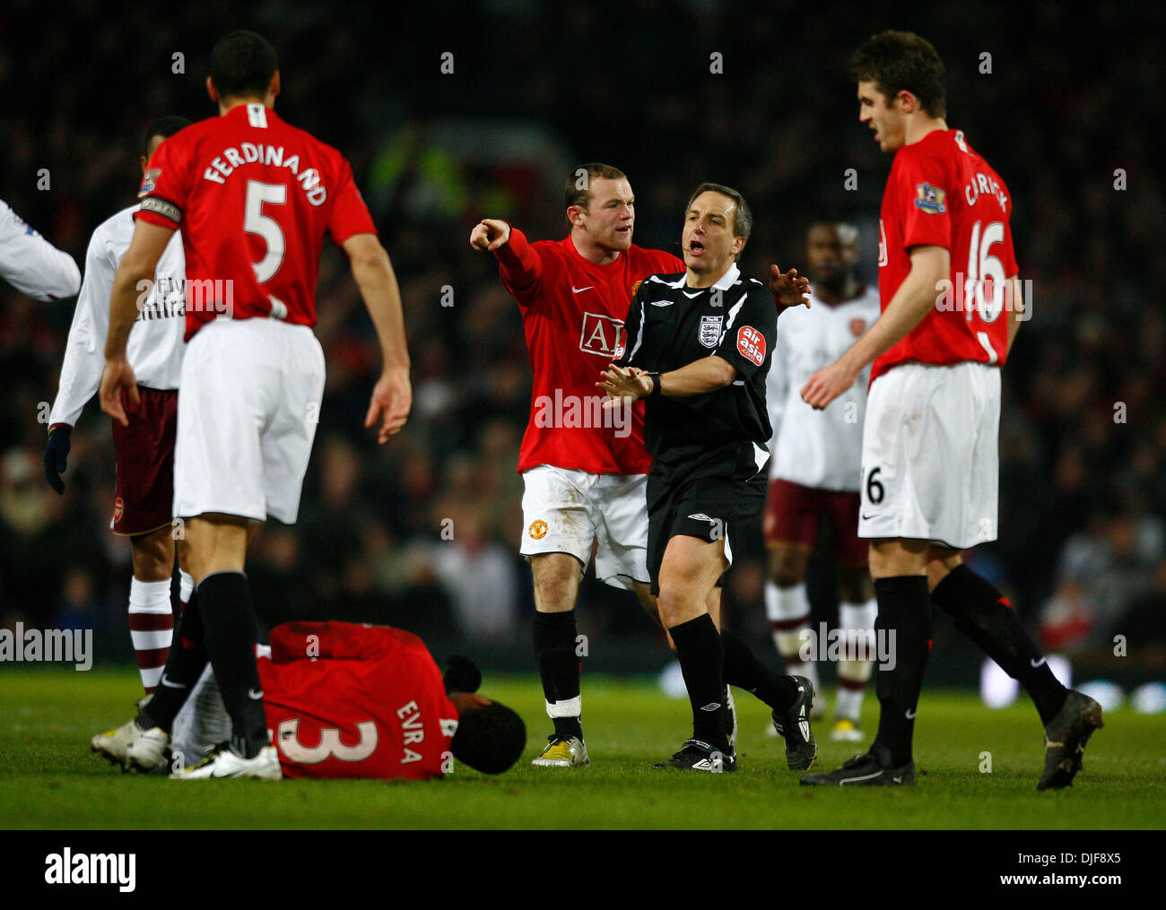 Wayne Rooney of Manchester United shouts a referee Alan Wiley following ...