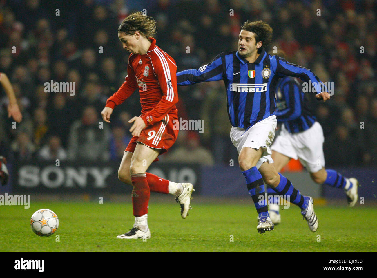 Liverpool's Fernando Torres and Christian Chivu of Inter Milan (Credit ...