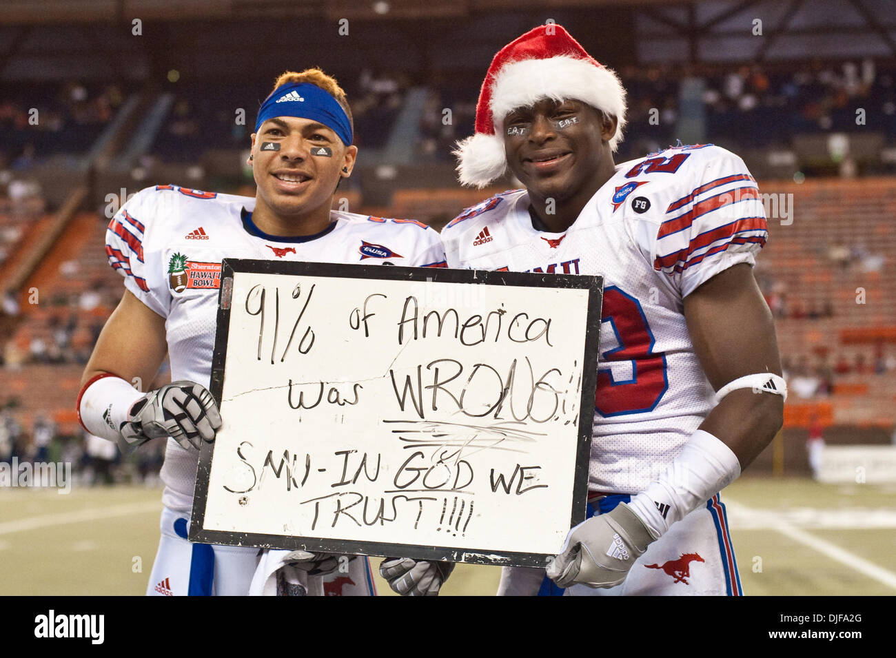 SMU players proudly display a sign they wrote after defeating the ...